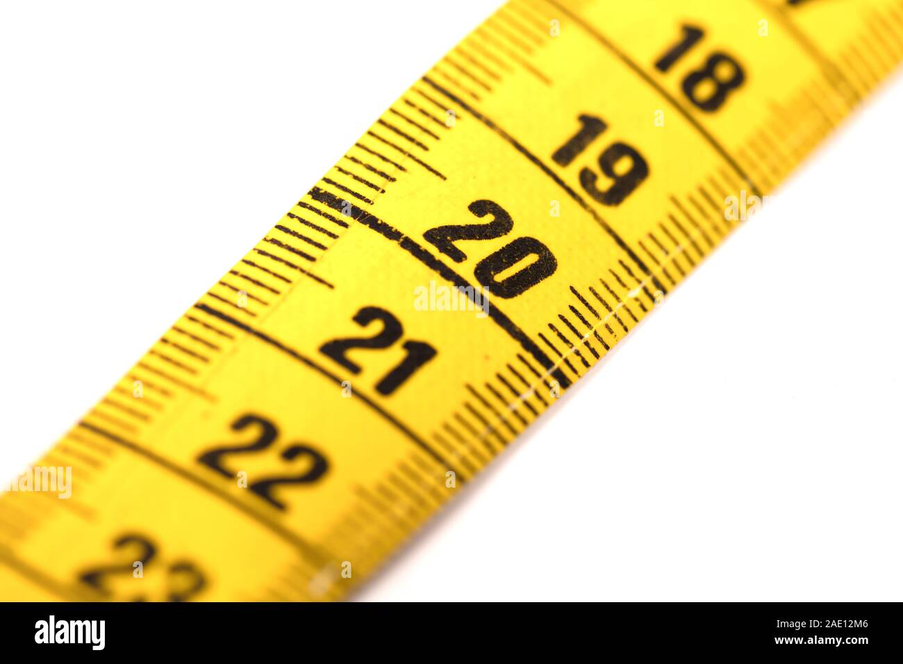 Measuring tape isolated on white, selective focus on 20 Stock Photo - Alamy