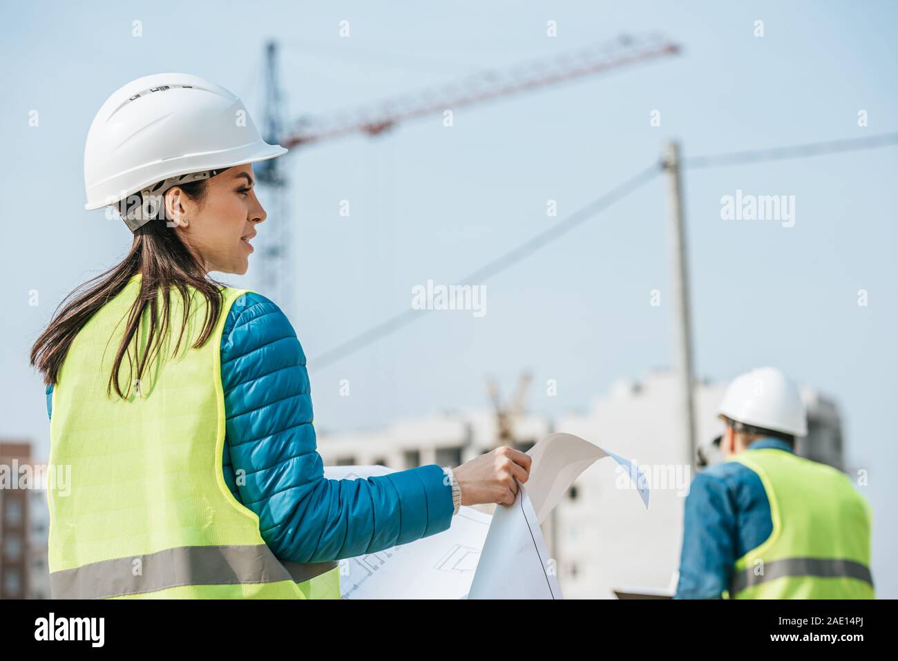 Woman construction survey hi-res stock photography and images - Alamy