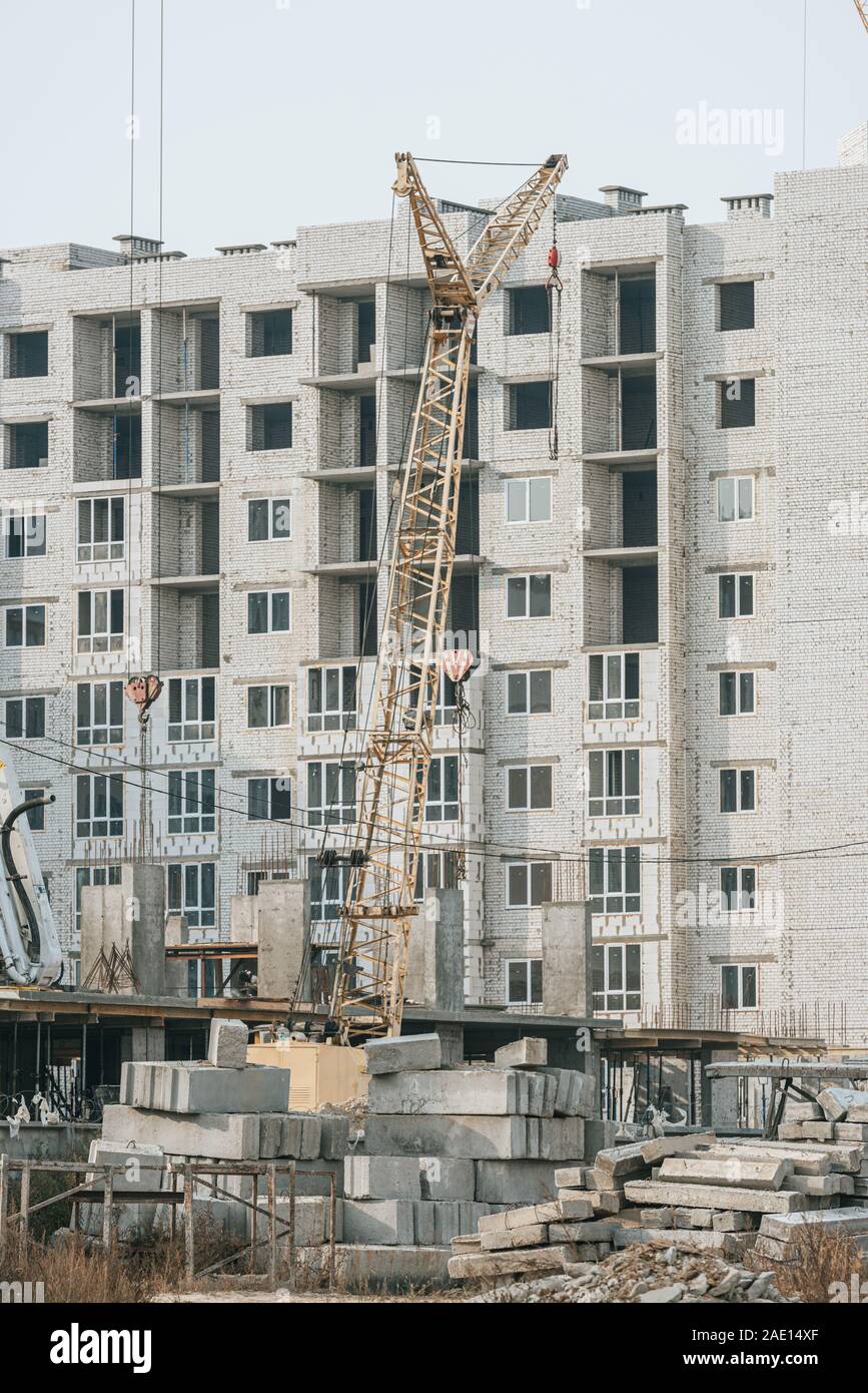 Construction site with crane and concrete blocks Stock Photo - Alamy