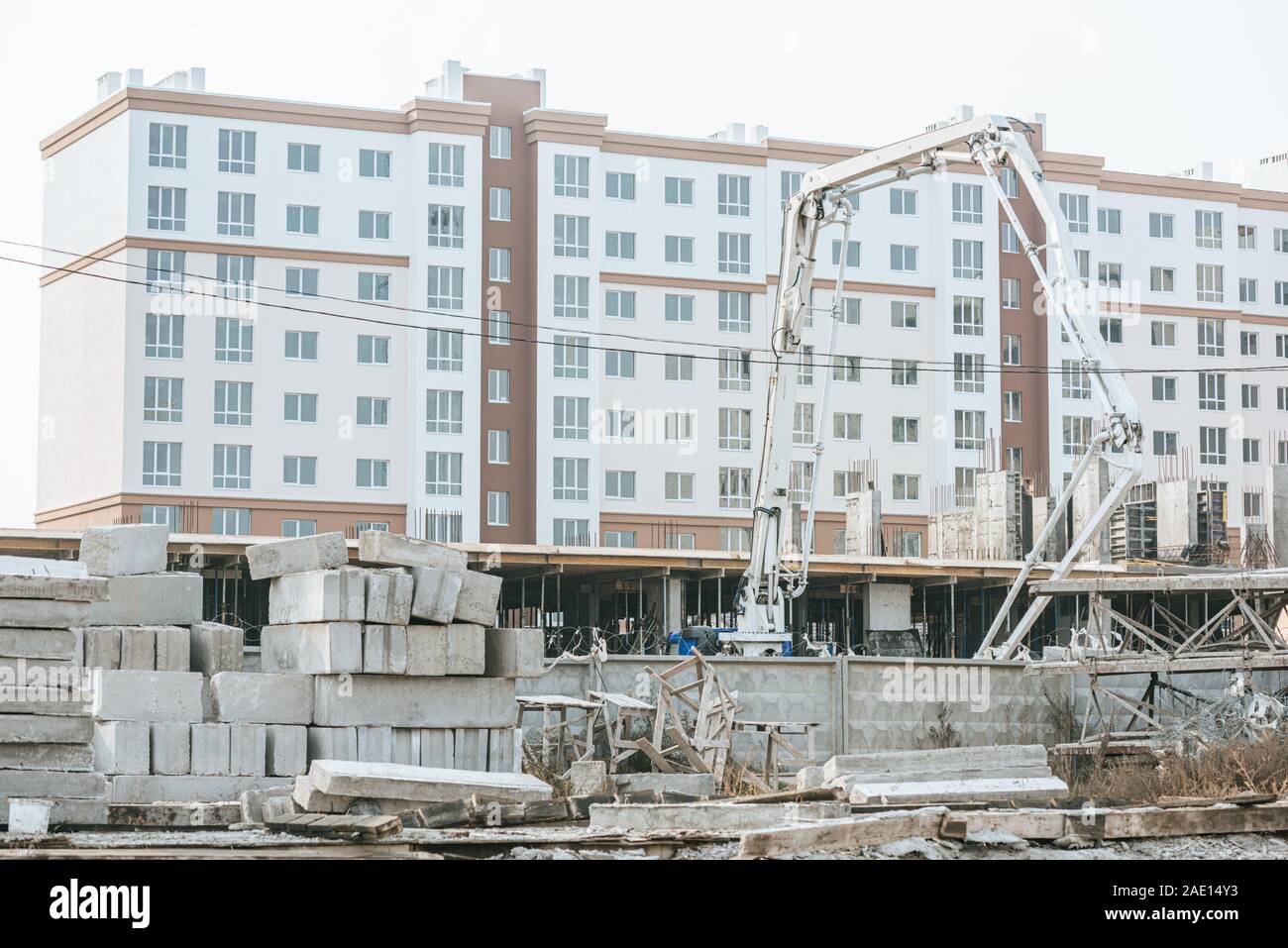 Construction site with crane and concrete blocks Stock Photo - Alamy