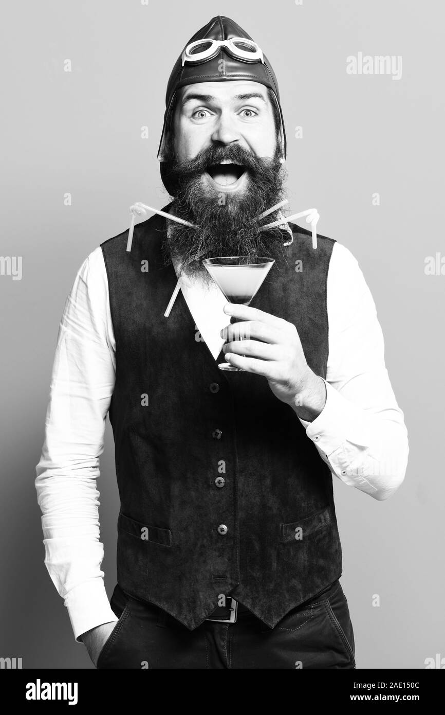 handsome bearded pilot or aviator man with long beard and mustache on ...