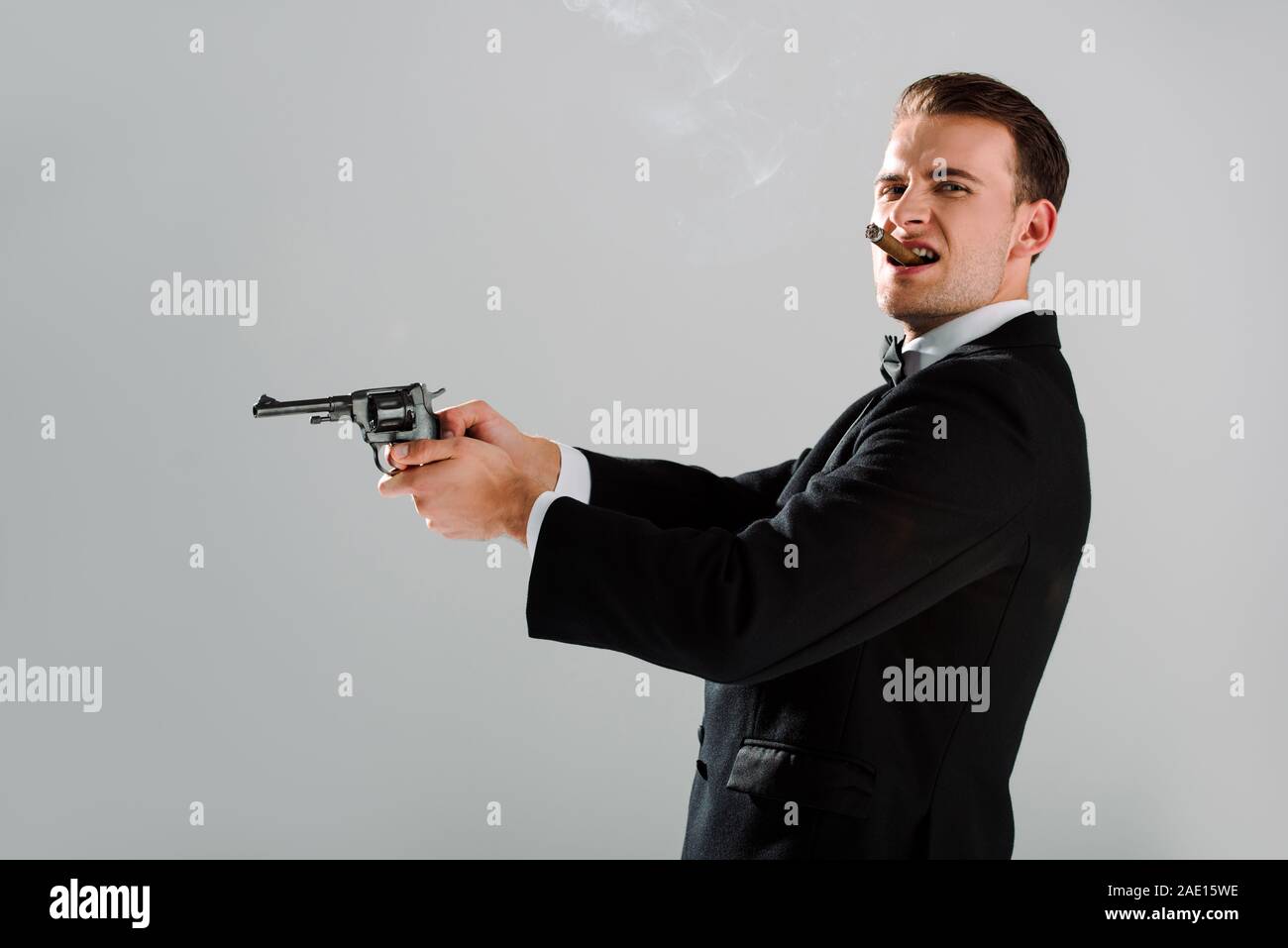 Man holding gun hi-res stock photography and images - Alamy