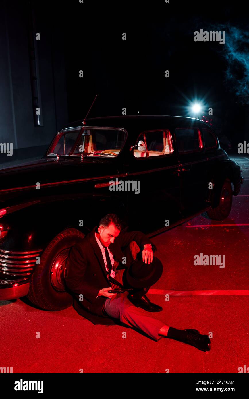 Gangster sitting hi-res stock photography and images - Alamy