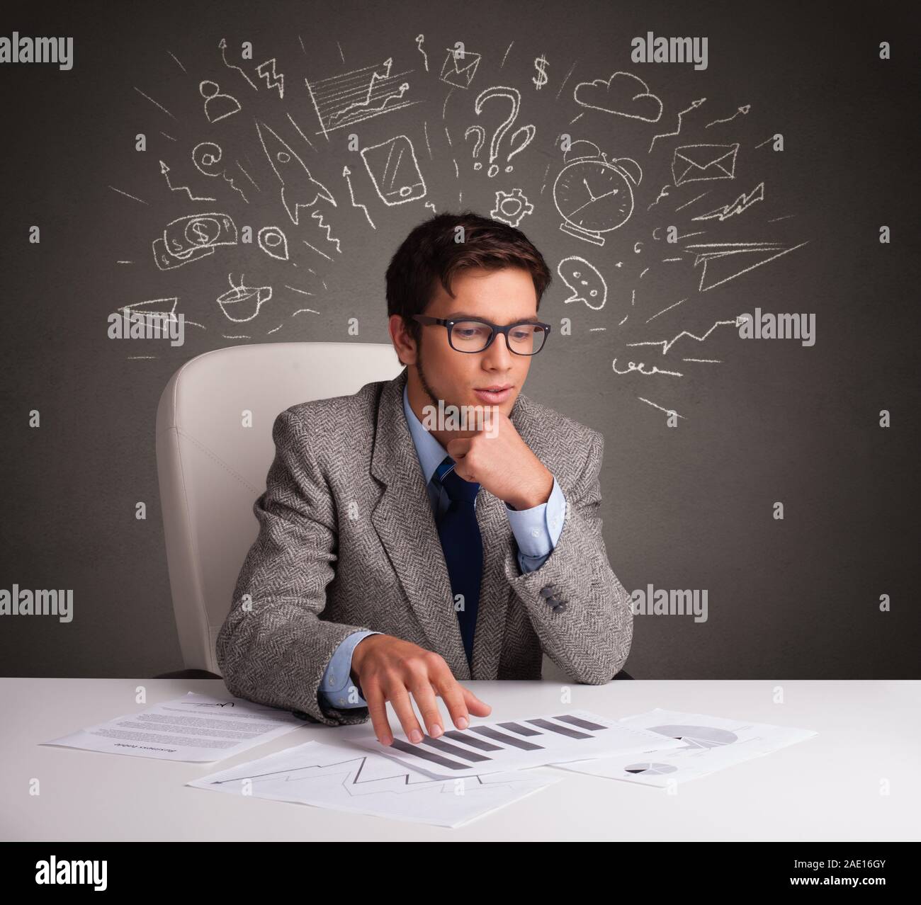 Manager in front of the office desk with different direction concept ...