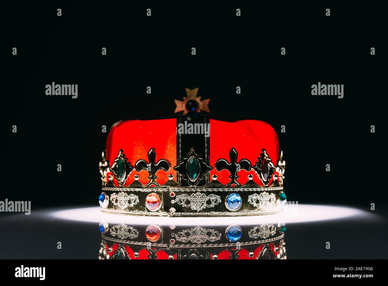 antique red golden crown with gemstones on black Stock Photo - Alamy