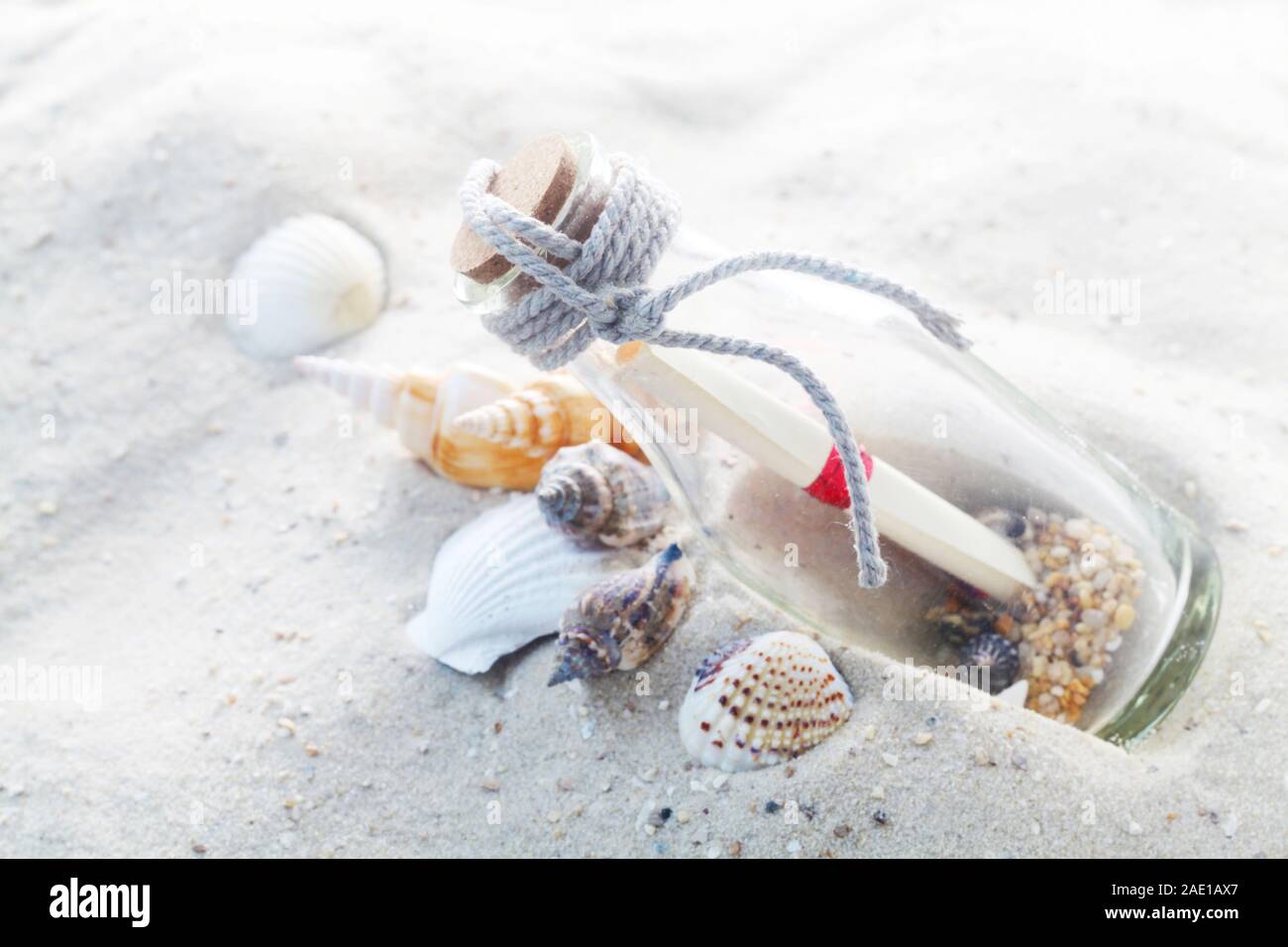 Message In A Bottle In The Sand Stock Photo - Alamy