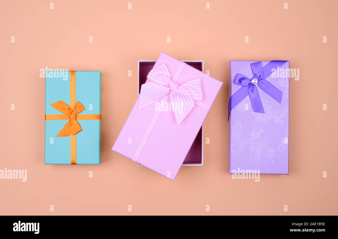 colorful rectangular gift boxes with bow Stock Photo - Alamy