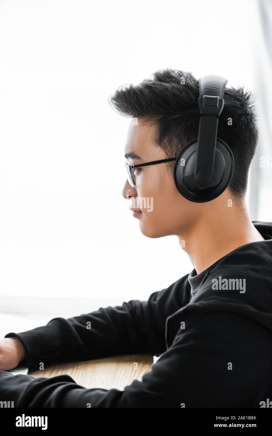 Side view asian hacker hi-res stock photography and images - Alamy