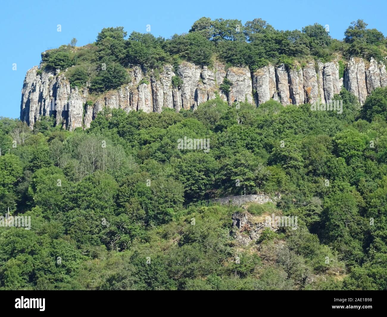 sheer cliffs formation in the forest in the south of France Stock Photo ...