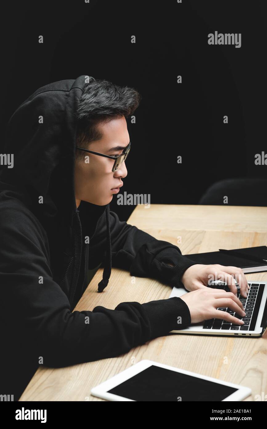 Side view asian hacker hi-res stock photography and images - Alamy