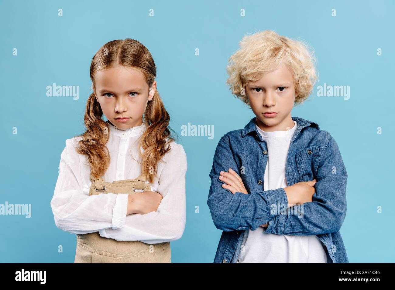 Kids isolated arms crossed hi-res stock photography and images - Alamy