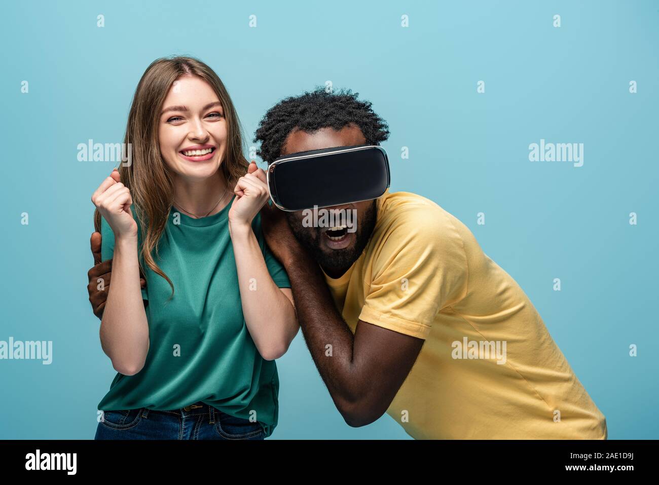 excited girl standing near scared african american boyfriend in vr ...