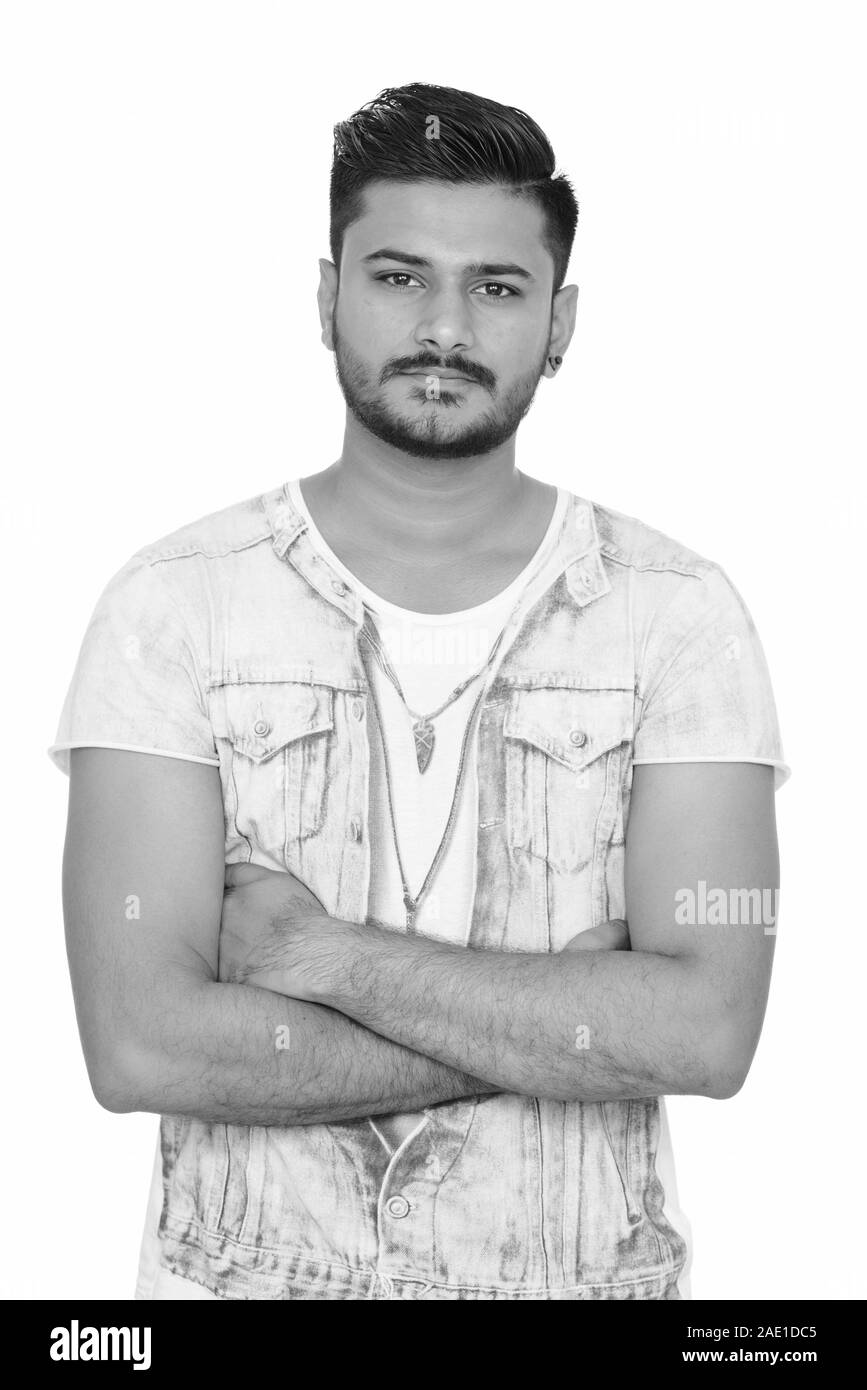 Young handsome Indian man with arms crossed Stock Photo - Alamy