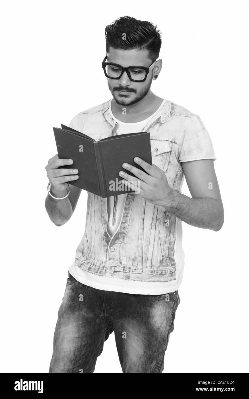 Indian man reading hi-res stock photography and images - Alamy
