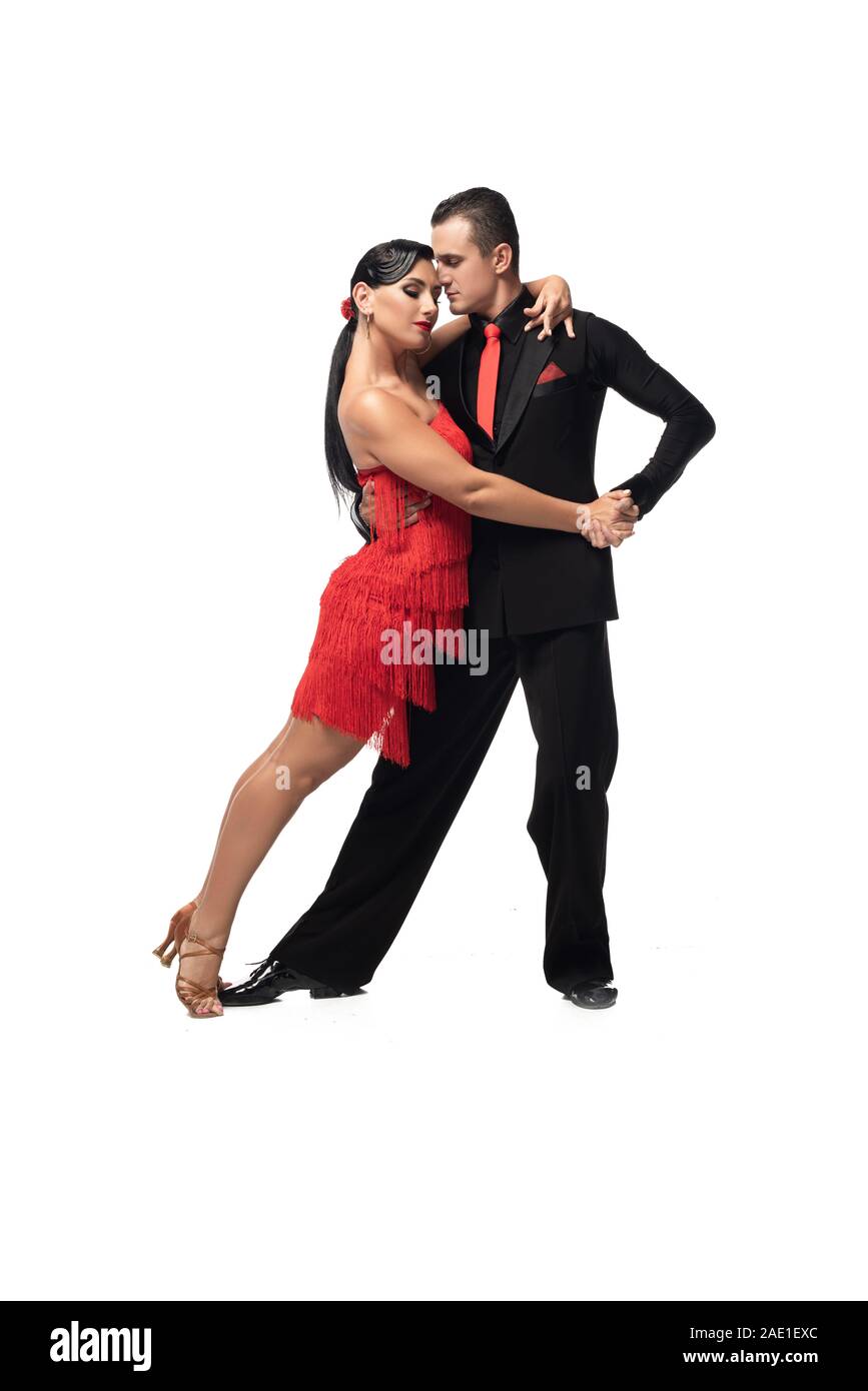 passionate couple of dancers performing tango on white background Stock ...
