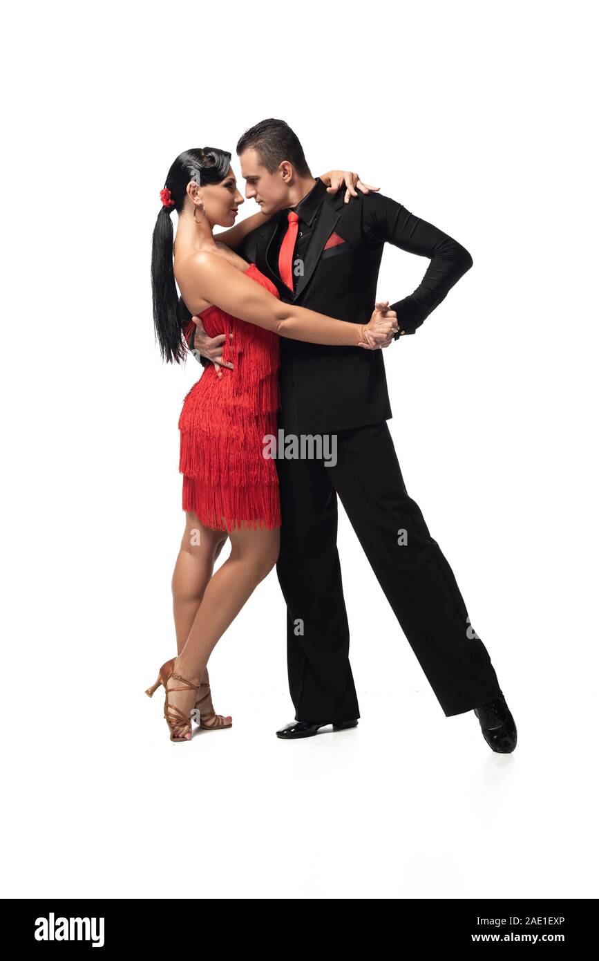 expressive couple of dancers performing tango on white background Stock ...