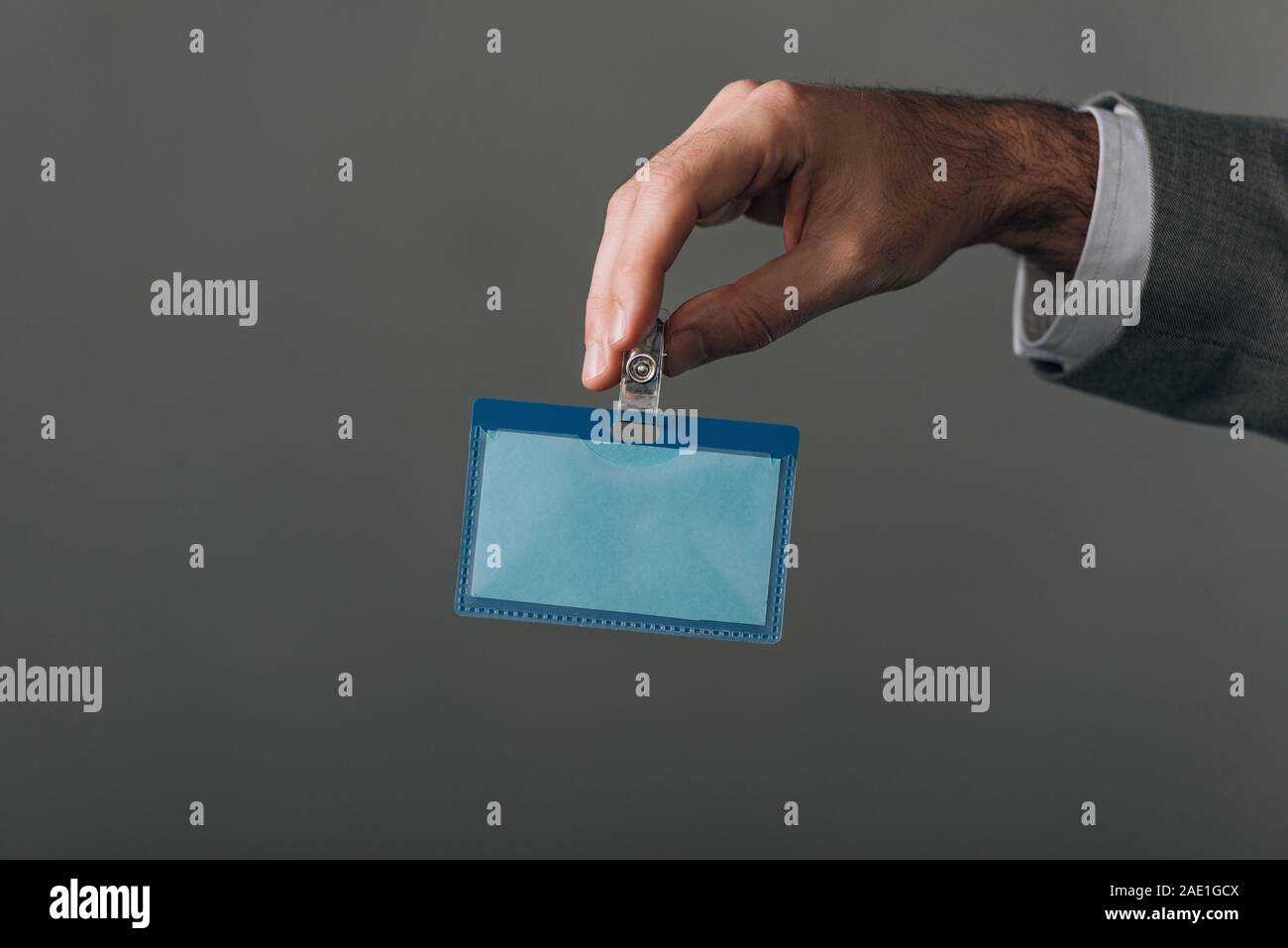 Holding badge hi-res stock photography and images - Alamy