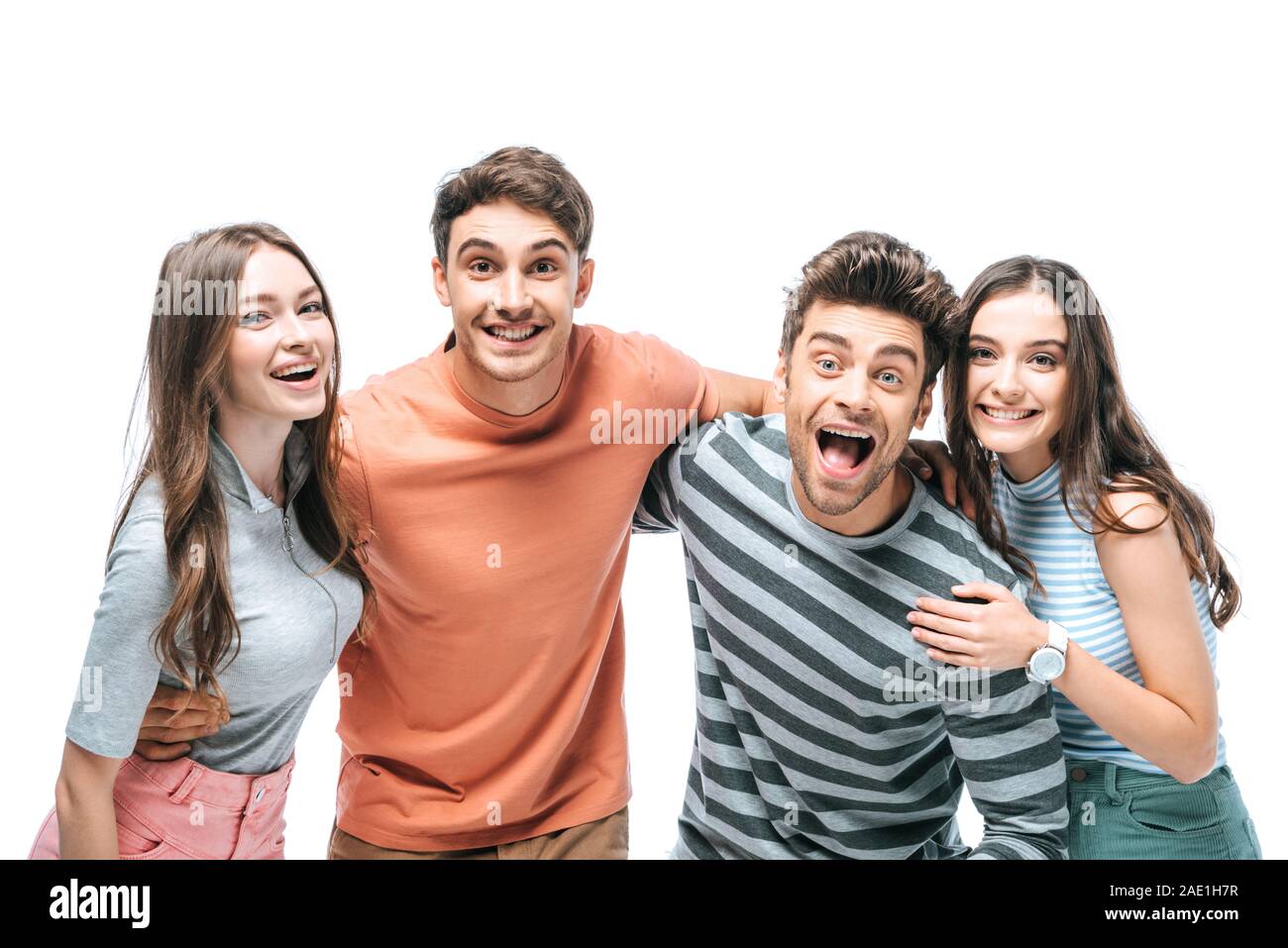 surprised friends screaming and hugging together isolated on white ...