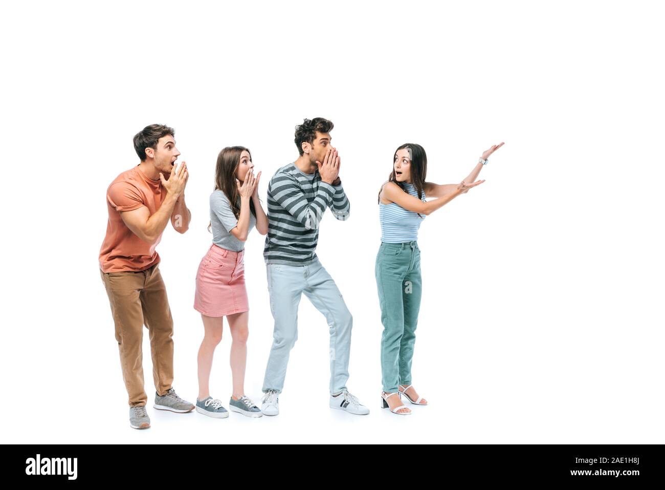 shocked friends pointing at something isolated on white Stock Photo - Alamy