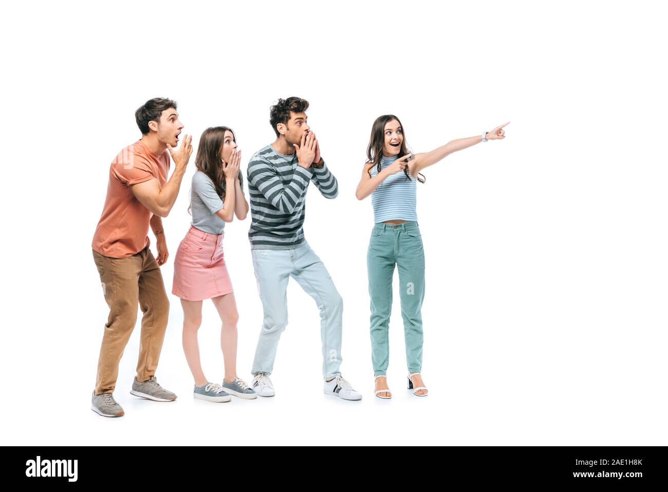 shocked friends pointing at something isolated on white Stock Photo - Alamy