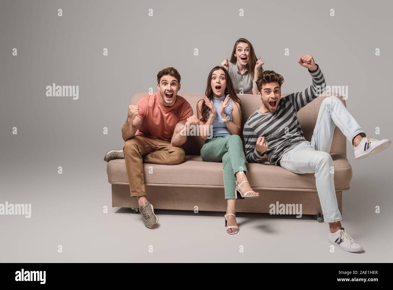 Cheering sofa hi-res stock photography and images - Alamy