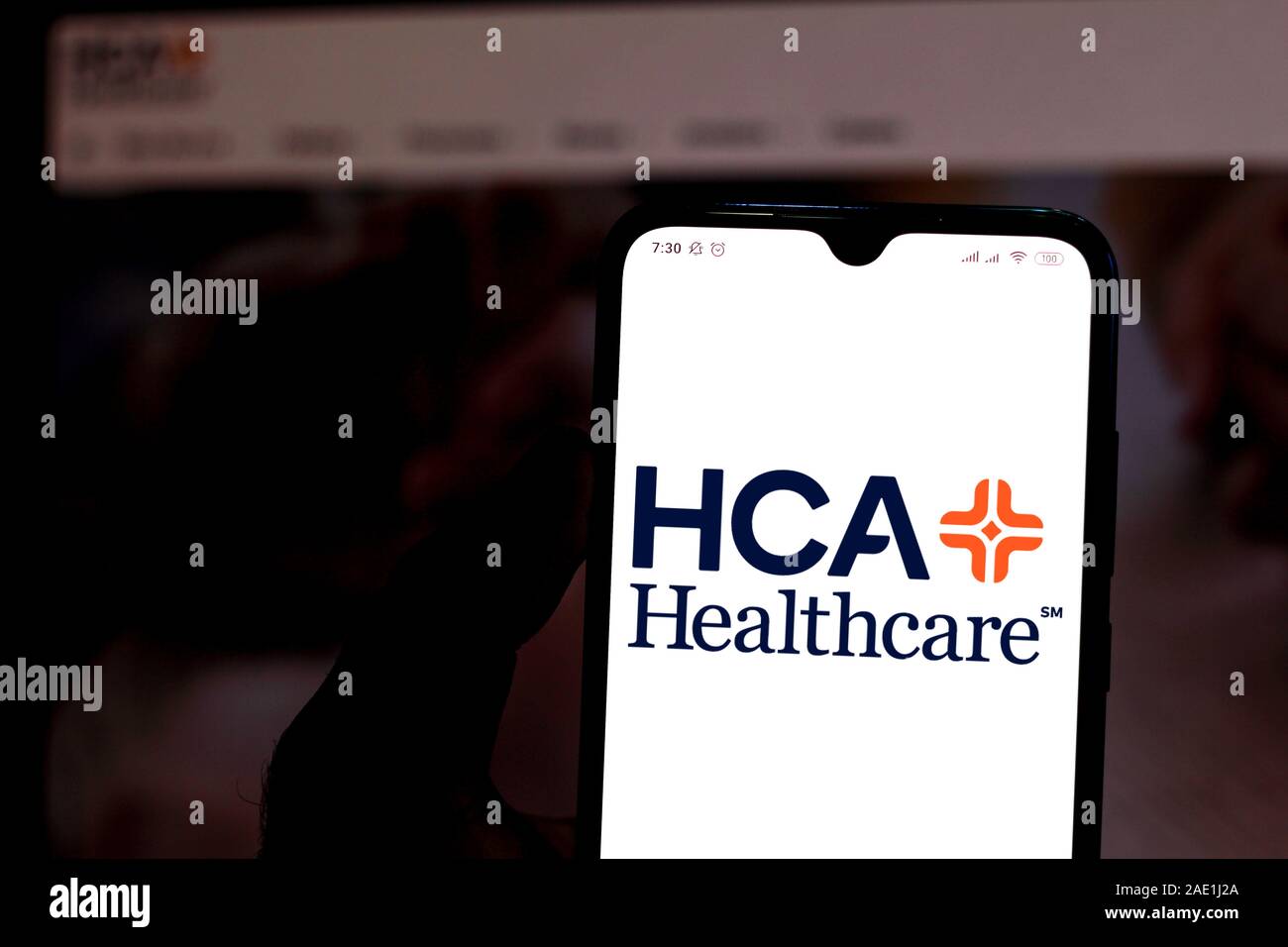 In this photo illustration the HCA Healthcare logo is seen displayed on ...