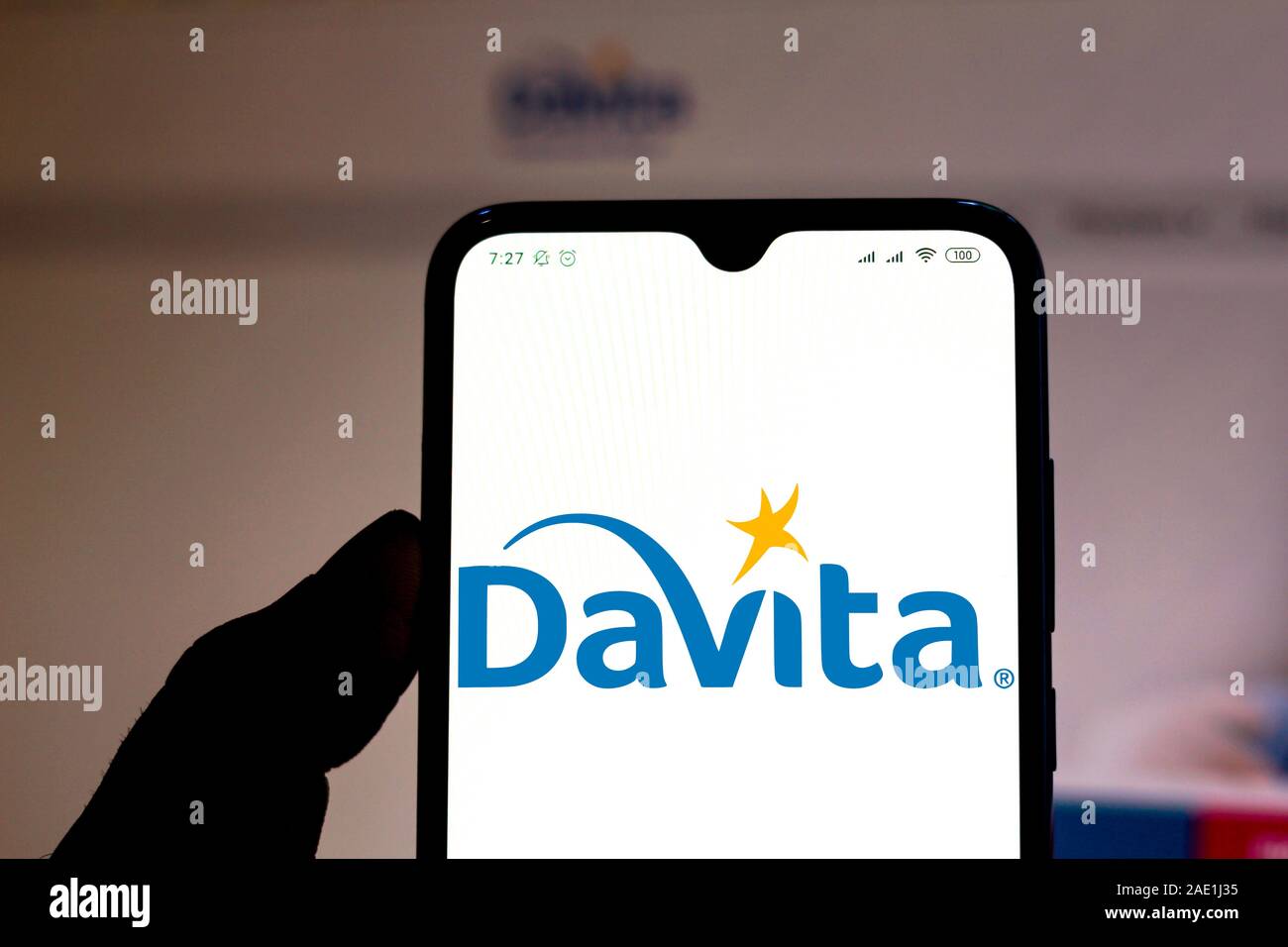In this photo illustration the DaVita logo is seen displayed on a ...