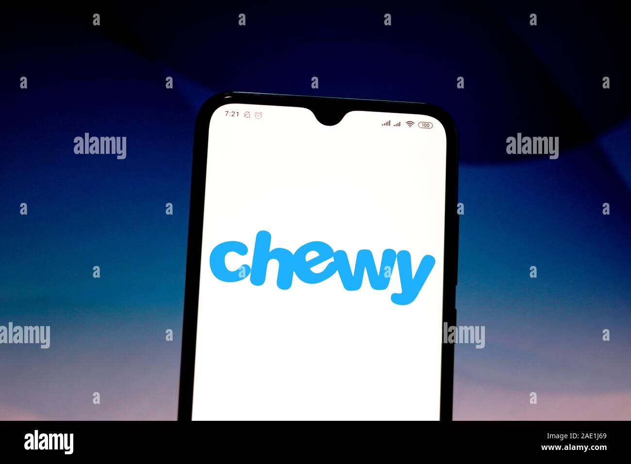 In this photo illustration the Chewy logo is seen displayed on a ...