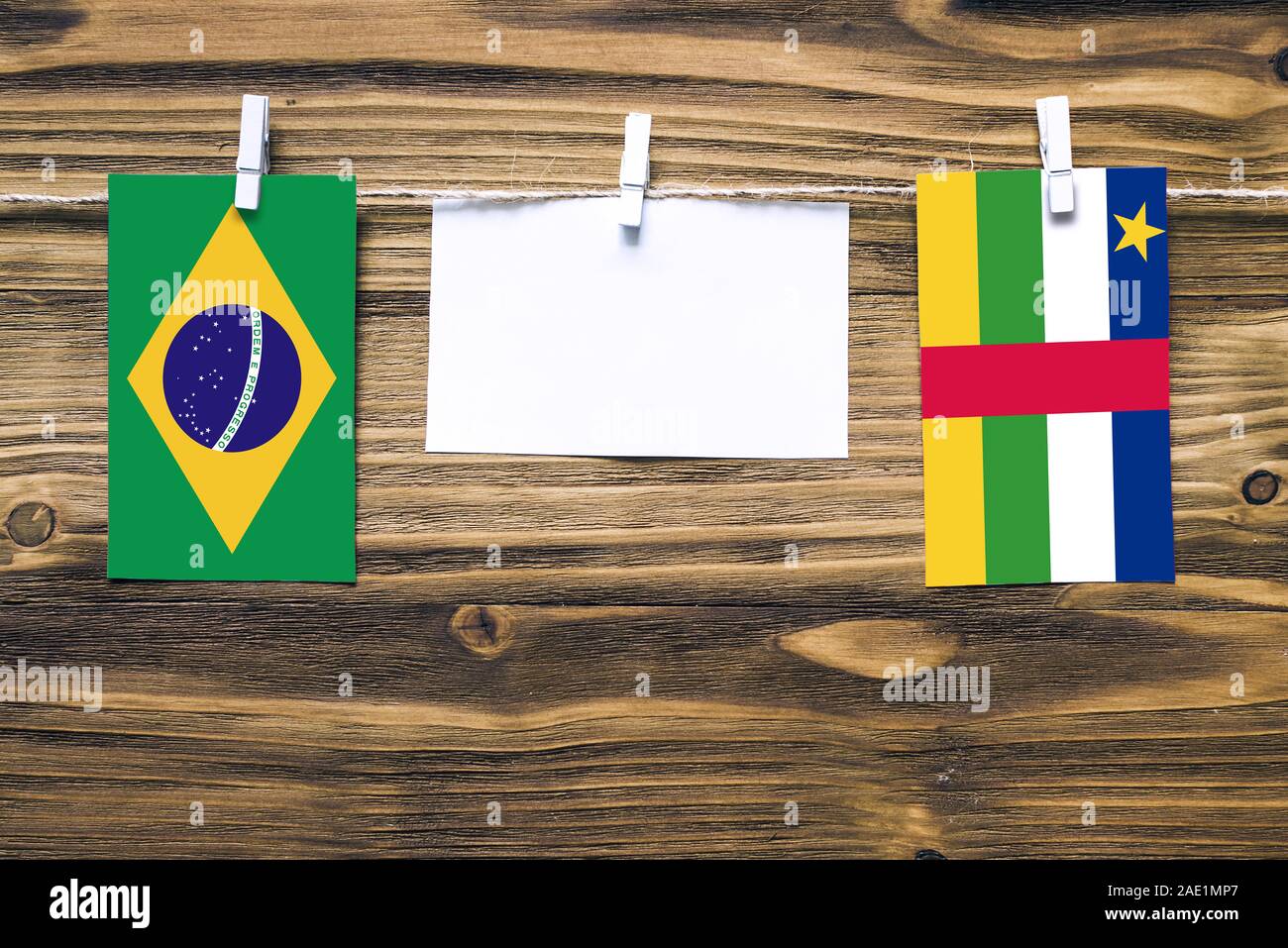 Hanging flags of Brazil and Central African Republic attached to rope ...