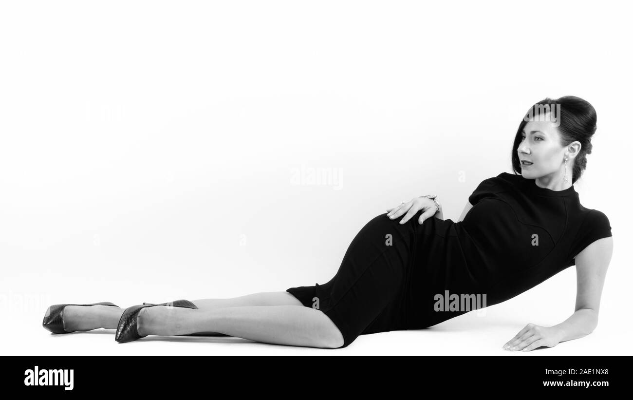 Young woman lying down portrait Black and White Stock Photos & Images ...