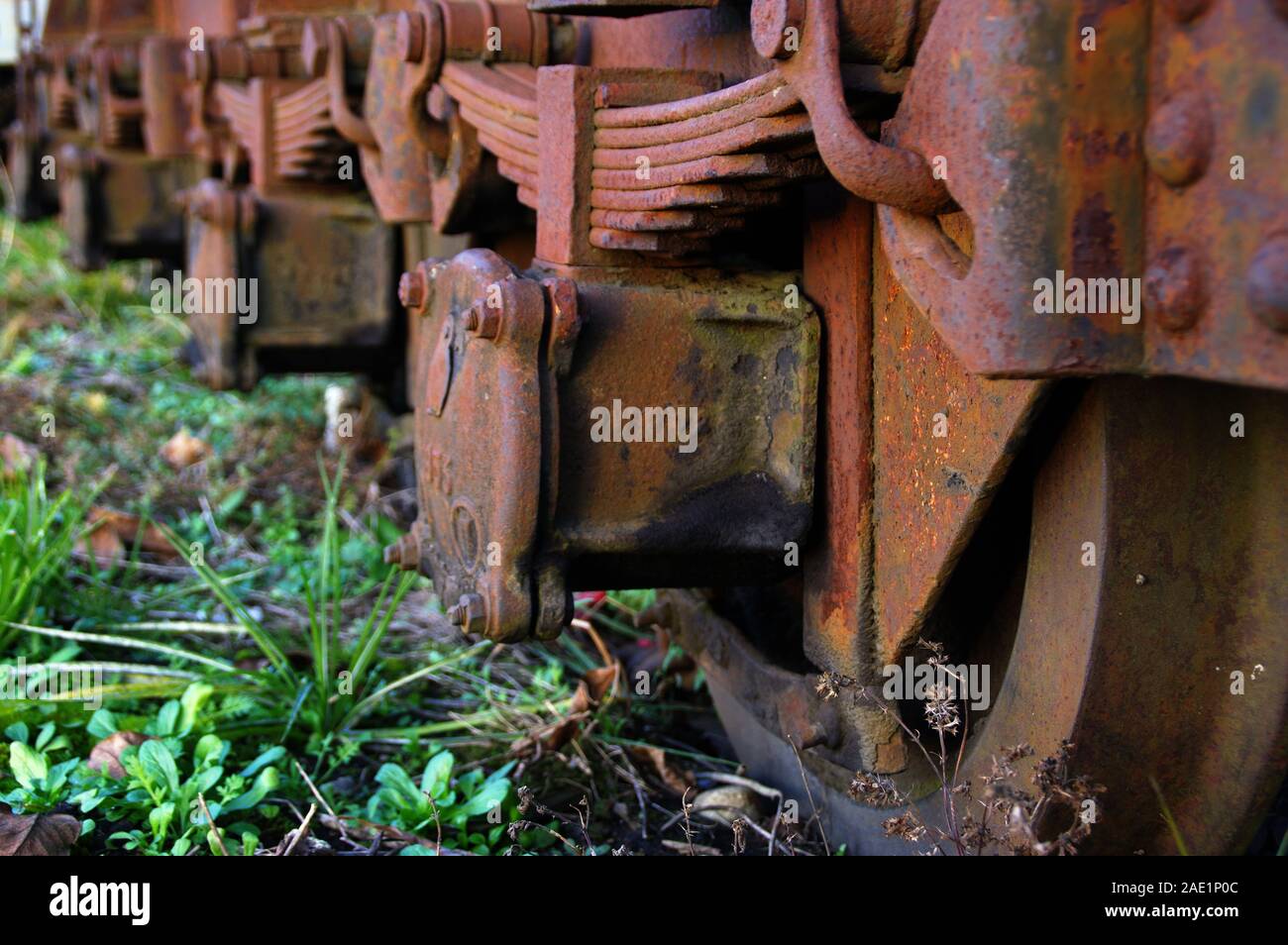 Rusty train wheels with springs. Forgotten industry. Rust on old ...