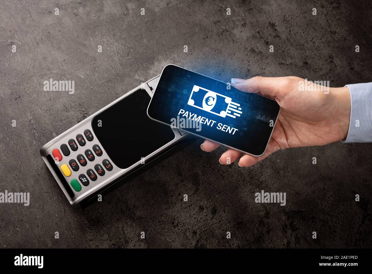Hand paying with digital currency from smartphone Stock Photo - Alamy