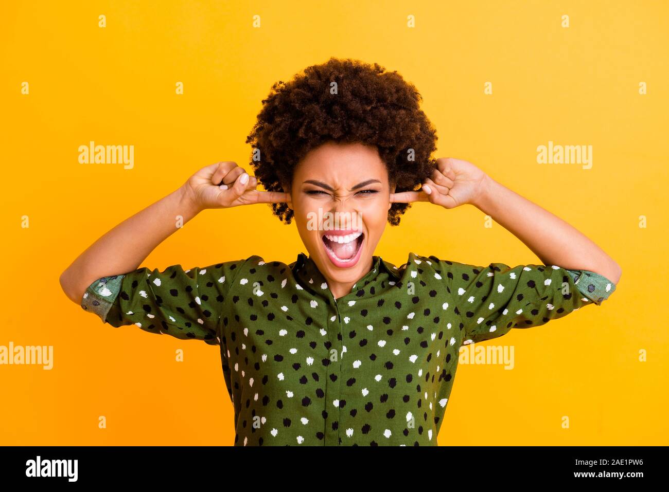 Stop it. Photo of beautiful crazy stressed dark skin lady holding ...