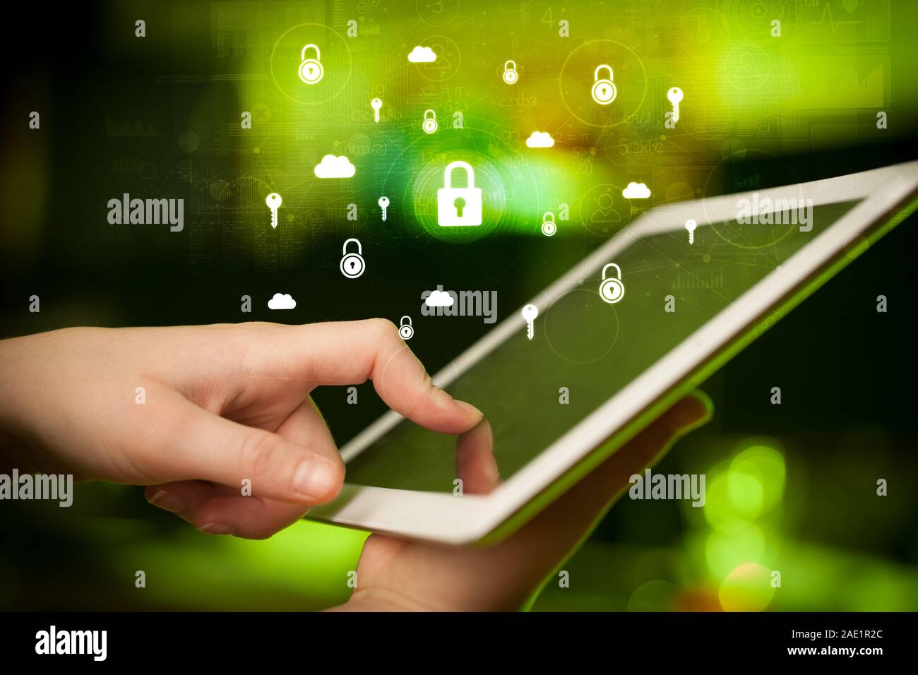 Hand holding tablet with online security system concept Stock Photo - Alamy