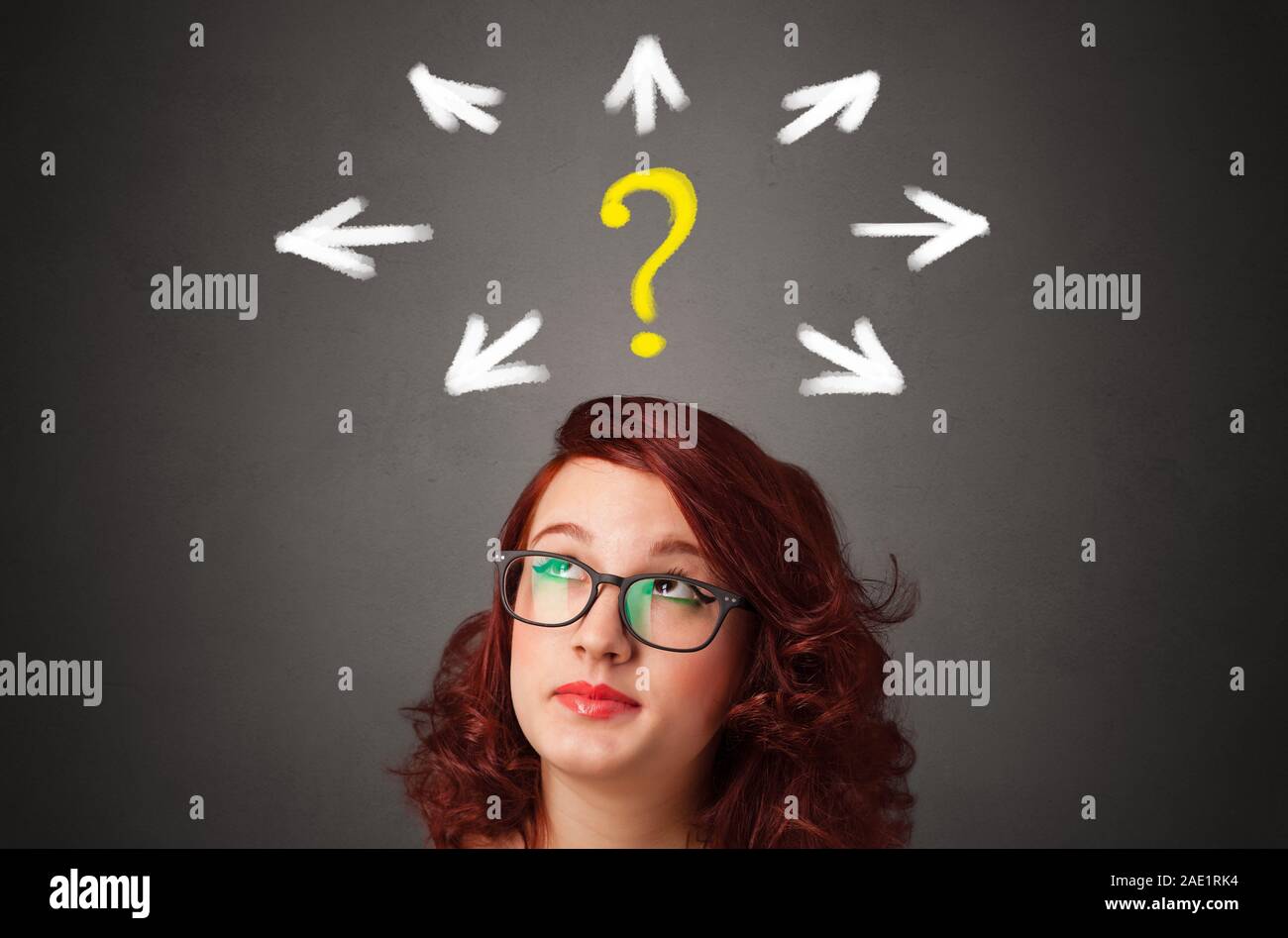 Girl with question marks and direction concept Stock Photo - Alamy