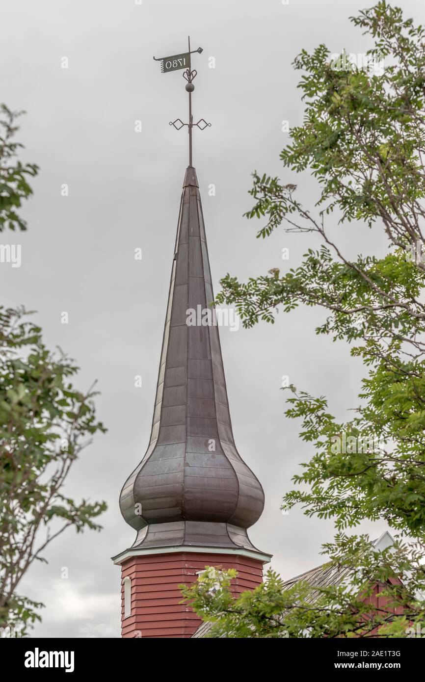 Arctic circle old church bell tower spire, shot under bright light at ...