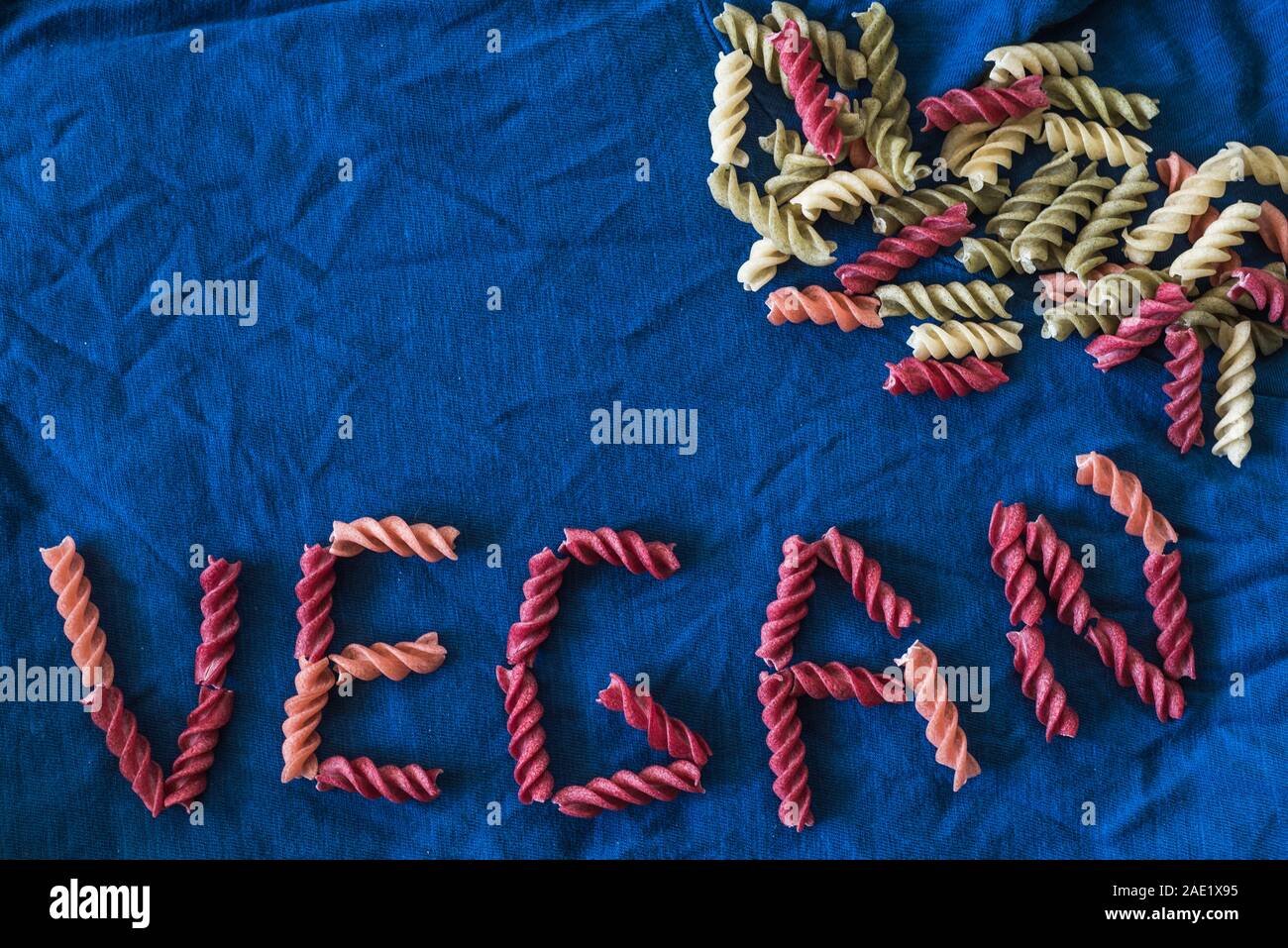 vegetarian pasta on a dark classic blue background copy space Stock ...