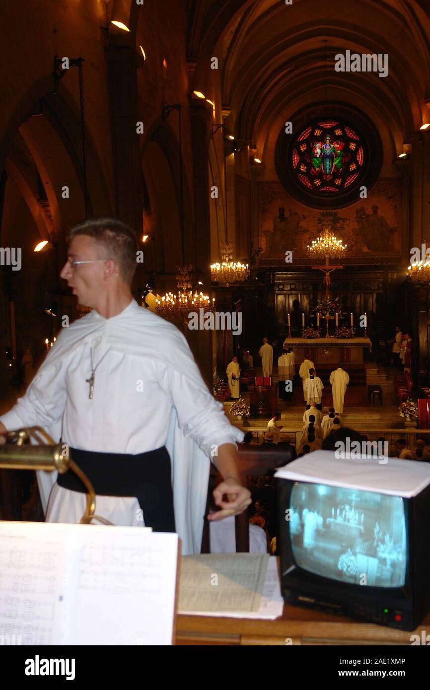 Choirmaster during the ordination of 3 new Catholic priests at the ...