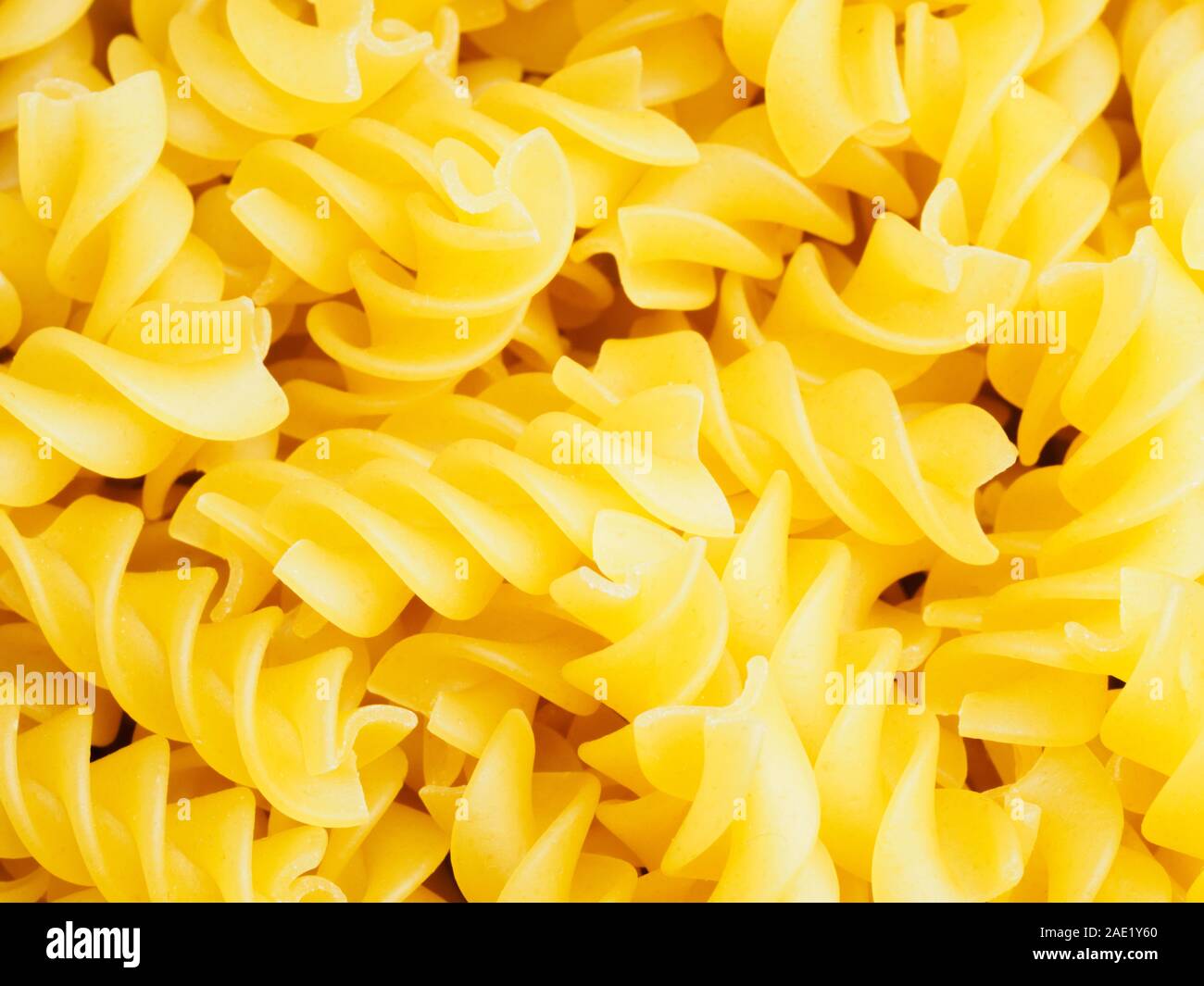 Background from pasta type helix. Healthy eating concept Stock Photo ...
