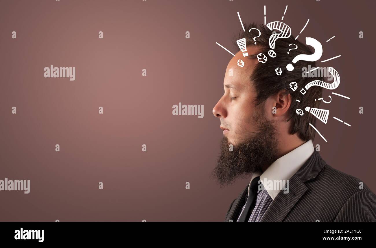 Head with white question marks, and copy space Stock Photo - Alamy