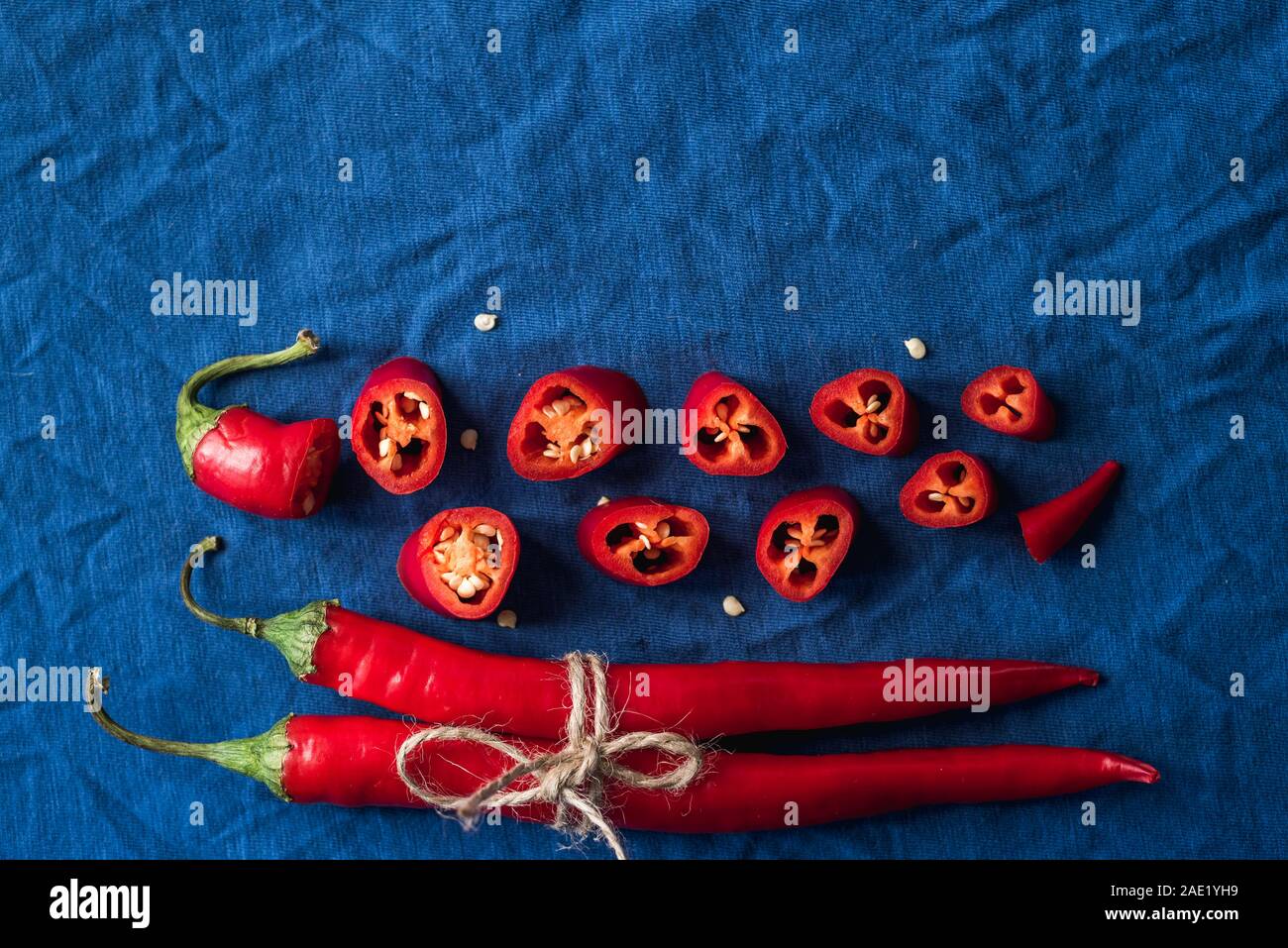 Red chili peppers close-up on classic blue background copy space Stock ...