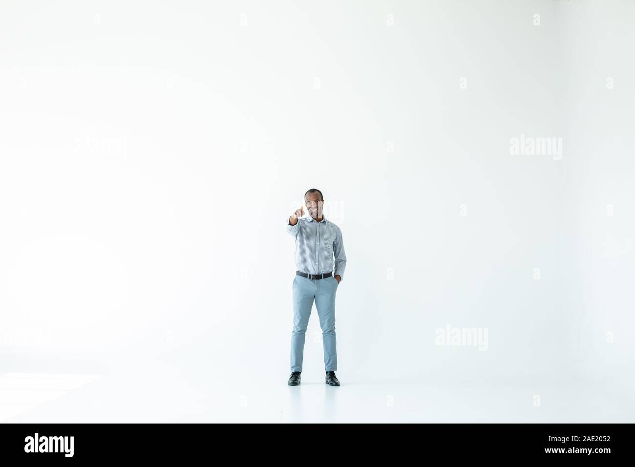 Positive afro american man pointing you Stock Photo - Alamy
