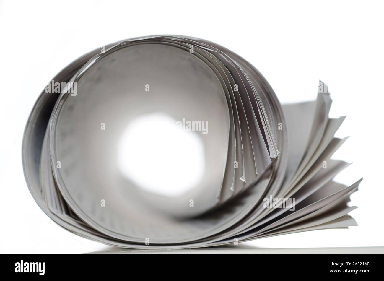 Rolled newspaper hi-res stock photography and images - Alamy