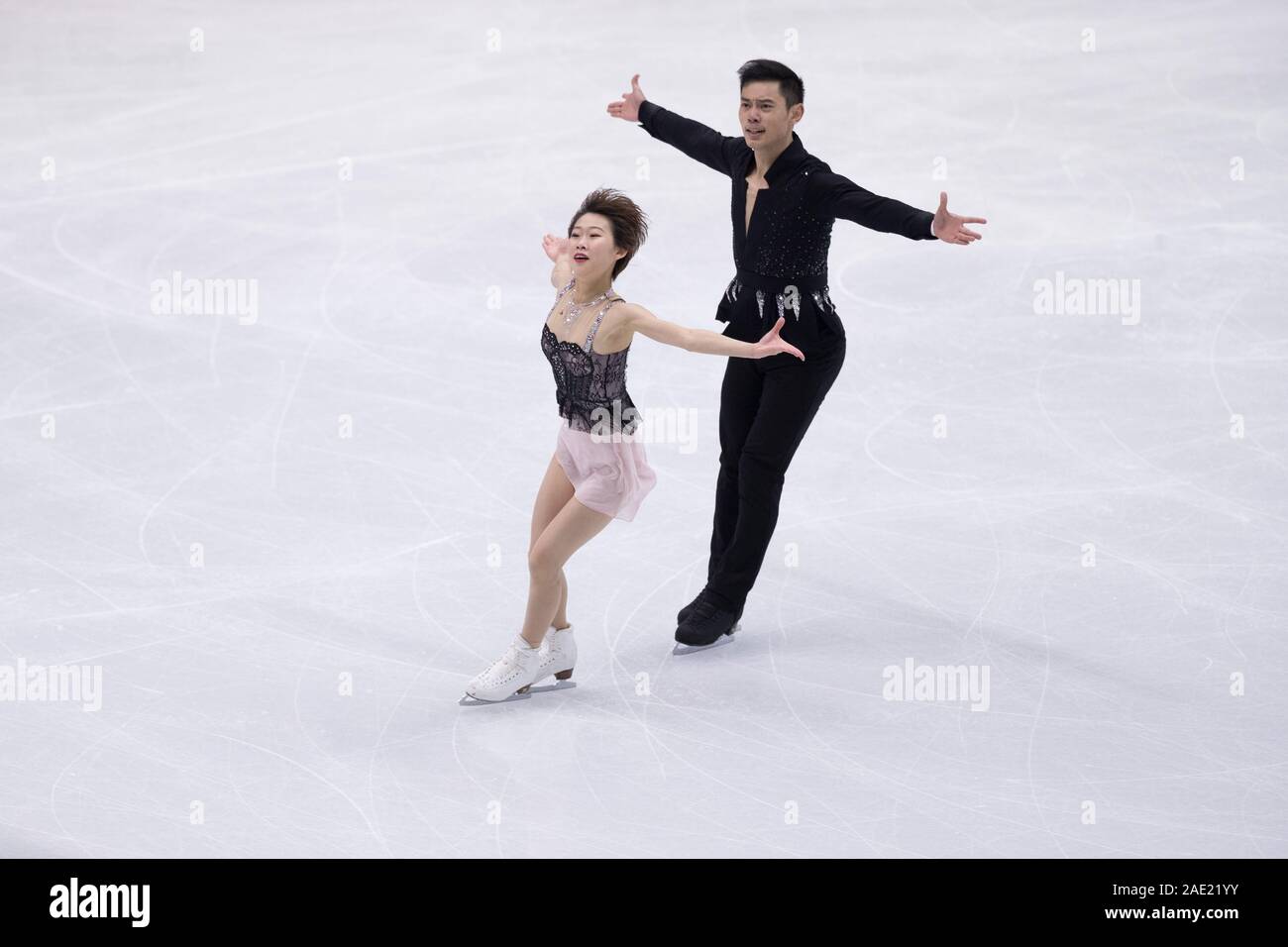 Cheng Peng and Yang Jin of China compete during senior pairs short ...