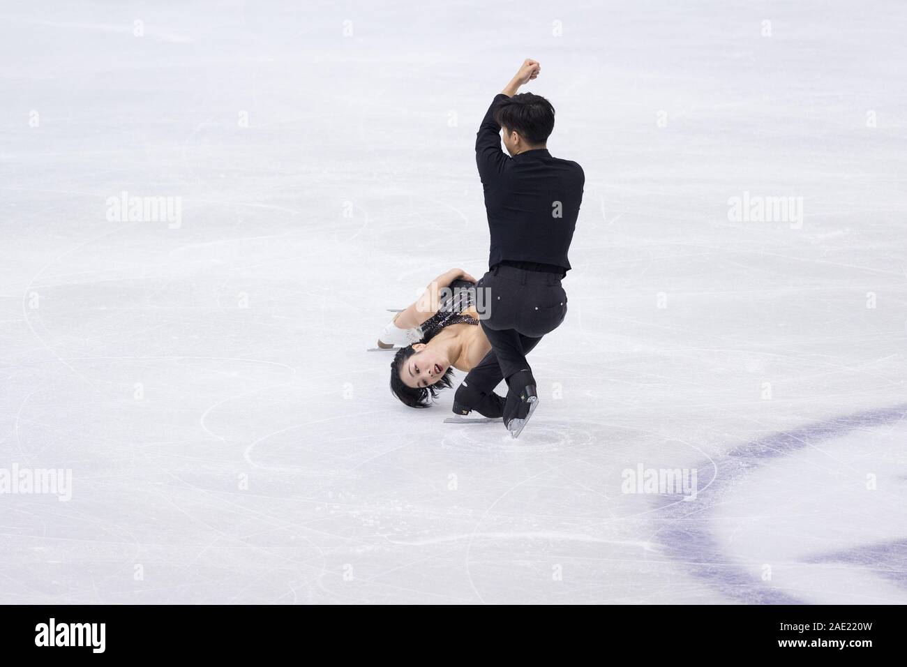 Wenjing Sui and Cong Han of China compete during senior pairs short ...