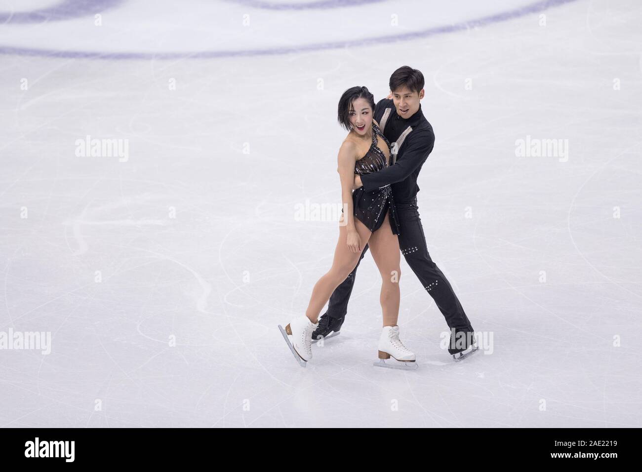 Wenjing Sui and Cong Han of China compete during senior pairs short ...