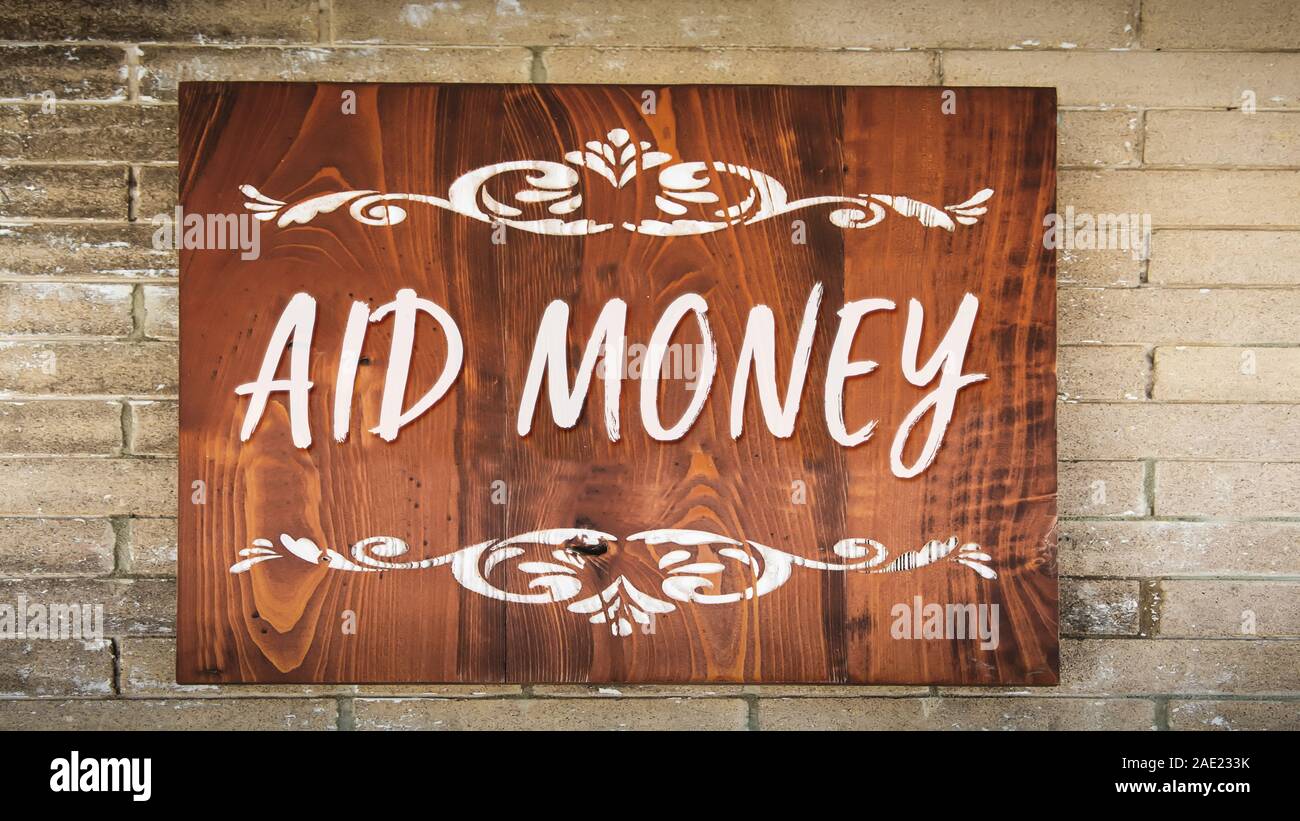 Street Sign the Direction Way to Aid Money Stock Photo - Alamy