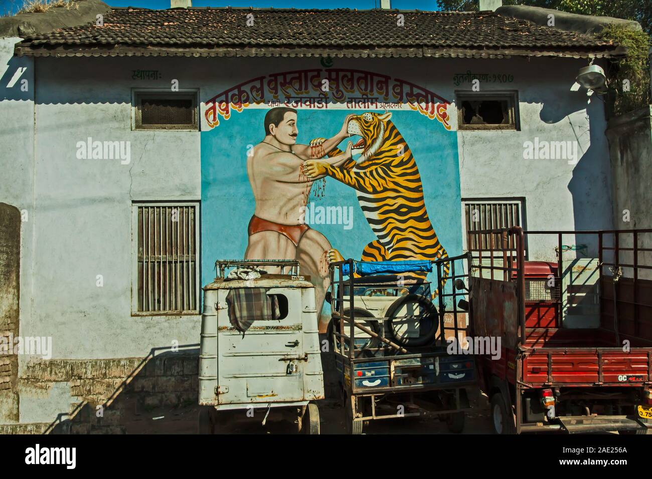 Man fighting tiger poster, Ahmednagar, Maharashtra, India, Asia Stock ...