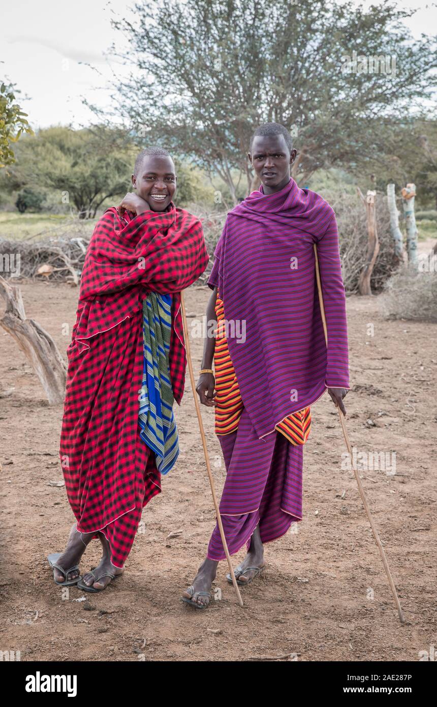 Same, Tanzania, 7th June 2019: maasai warriors resting Stock Photo - Alamy