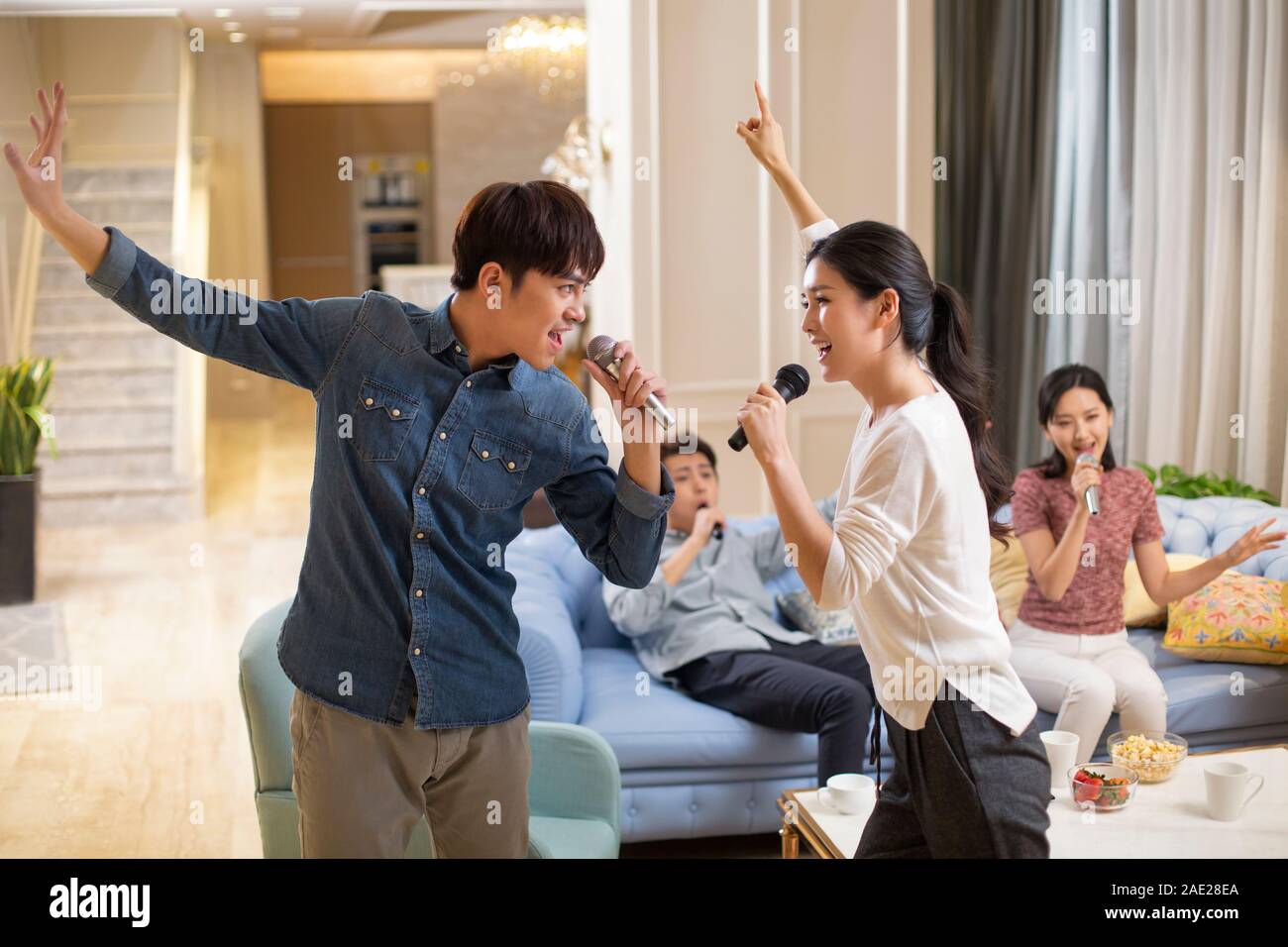 Singing arms raised gesturing hi-res stock photography and images - Alamy